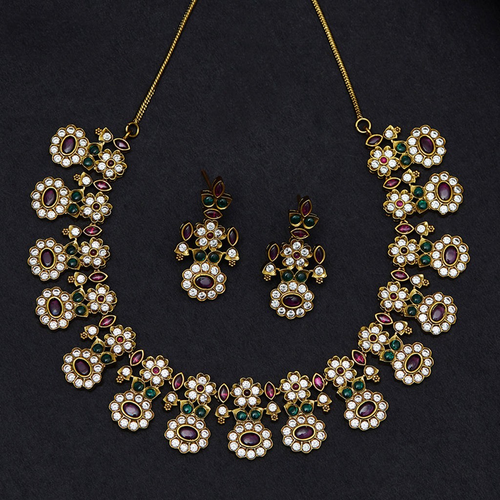 Delicate Floral Motifs CZ Adorned Brass Gold Toned Jewellery Set – VOYLLA